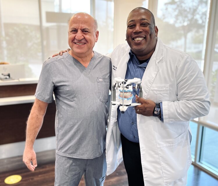 Giving a smile back to this Miami volunteer, "Doc" Kenya Smith : Ivoclar